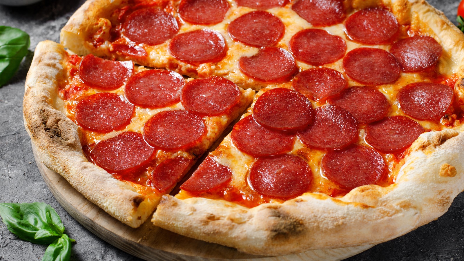 how to cook frozen cooked pizza